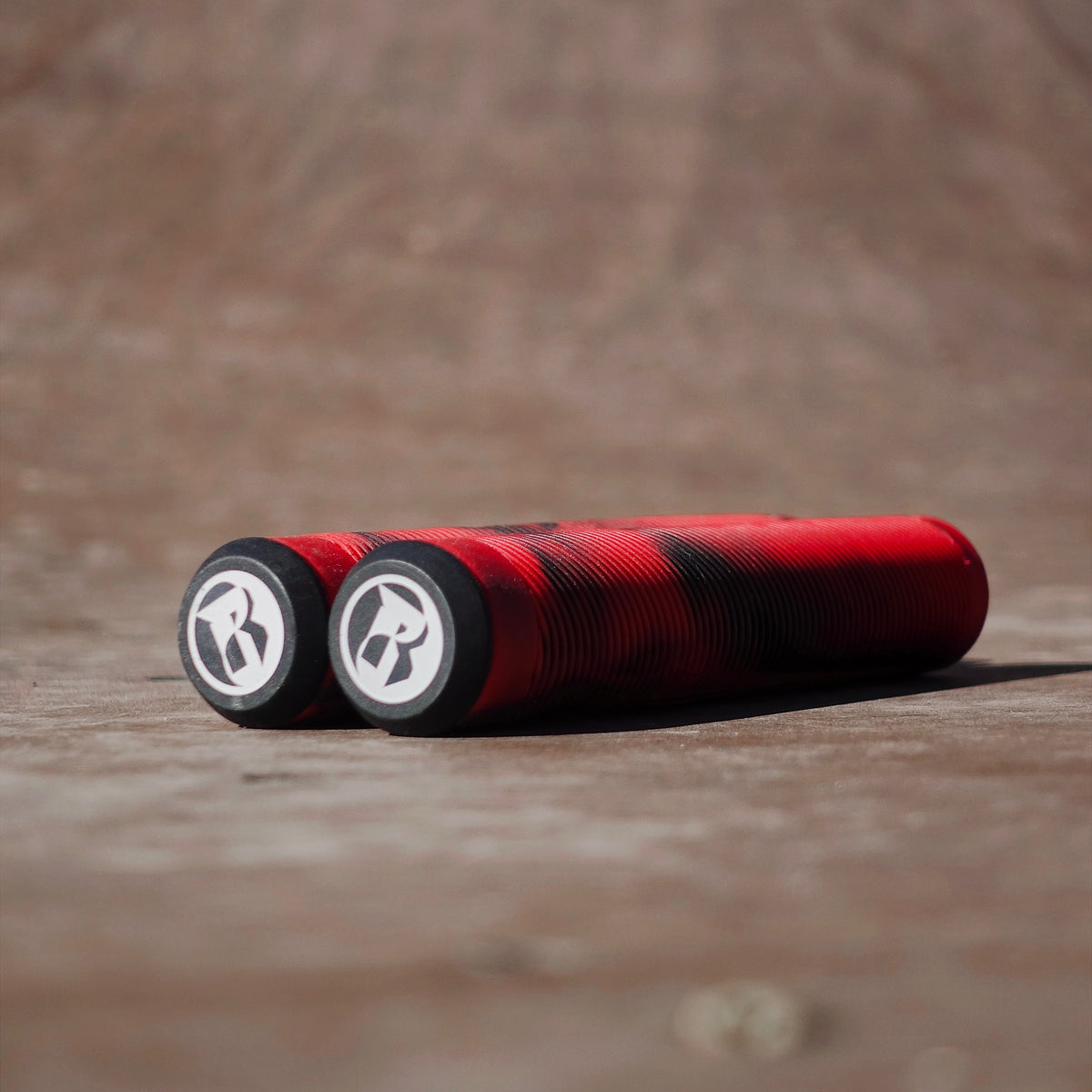 Red and Black Swirl Grips – RaptureProScooters